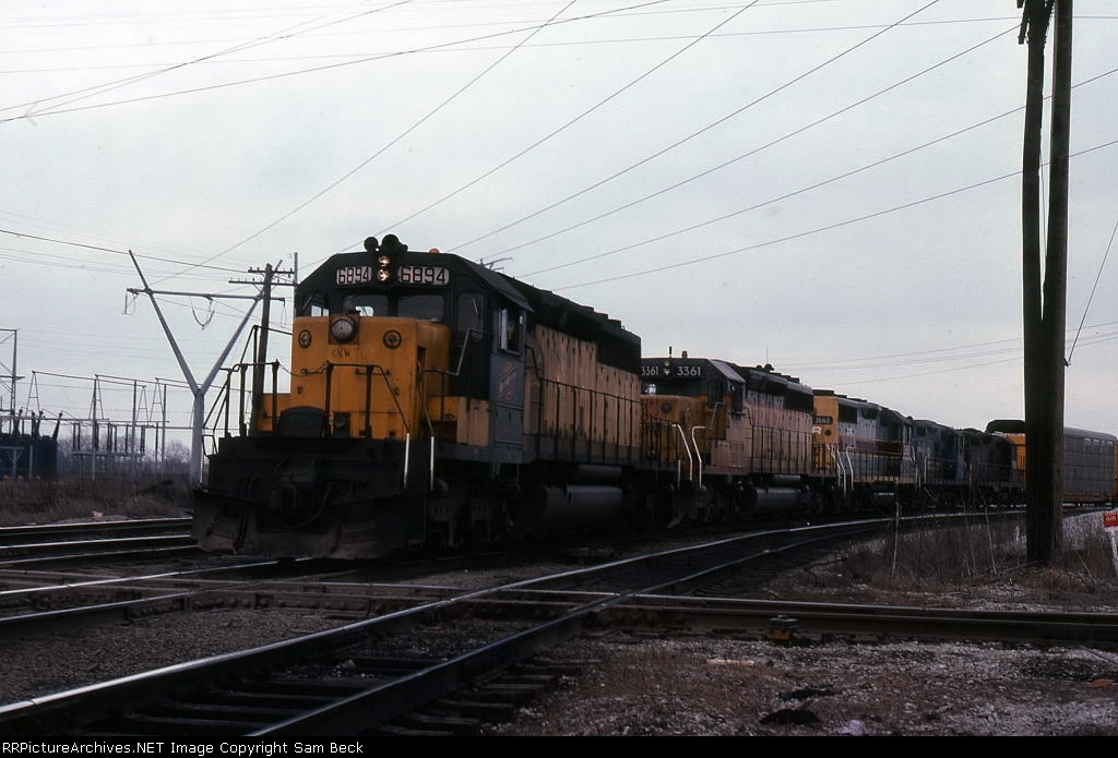 CNW 6894, UP 3361, CR 3660, and 2 CR Geeps